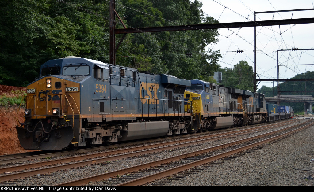 CSX ES40DC 5394, Diversity in Motion 699 and CSX 815 on Q034-03